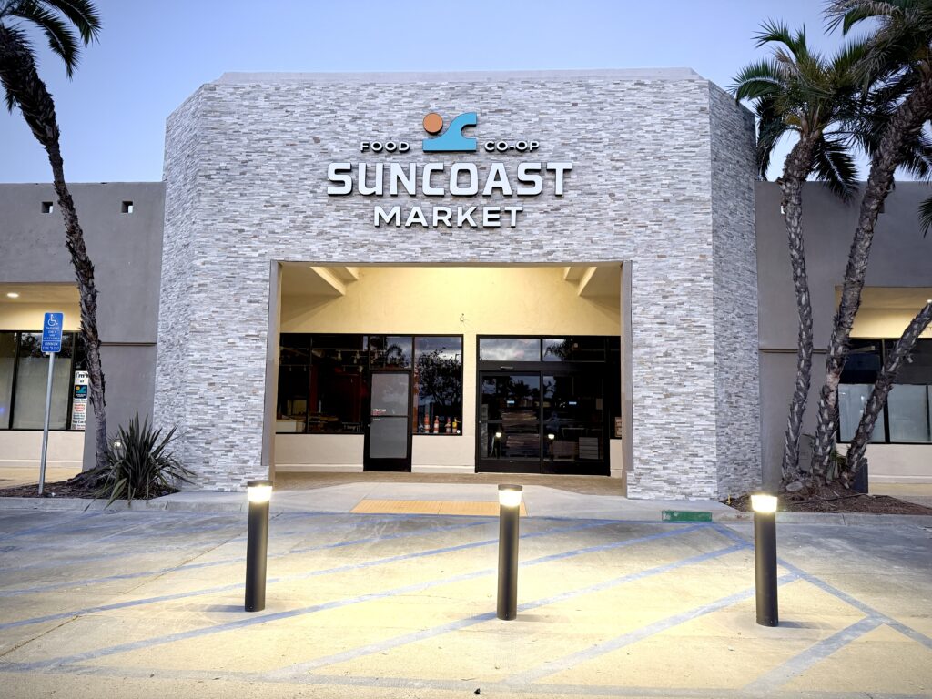 Storefront Sign Installed - SunCoast Market Co-op